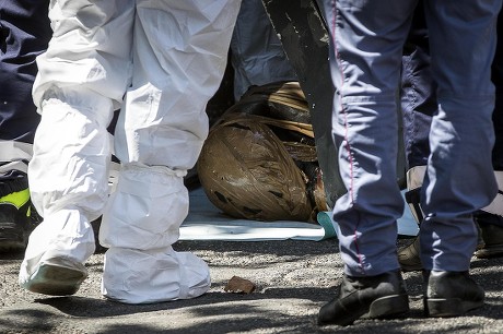Human body parts found in trash bin in Rome, Italy - 16 Aug 2017 Stock ...