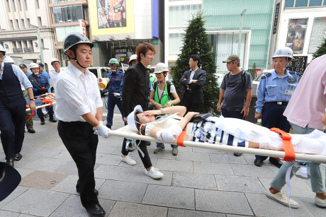 People Carry Injured Persons Stretchers During Editorial Stock Photo ...