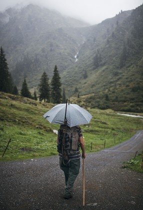Hunter Protects Himself Umbrella He On Editorial Stock Photo - Stock ...