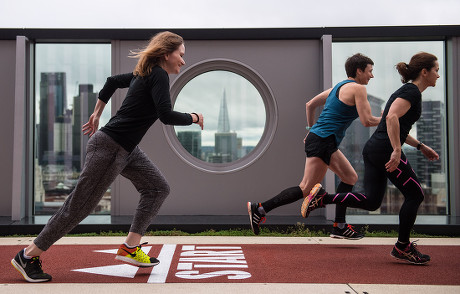 Runners On 16th Floor Running Track Editorial Stock Photo - Stock Image ...