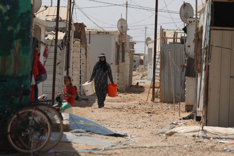 Syrian Refugee Carries Water Buckets Street Editorial Stock Photo ...