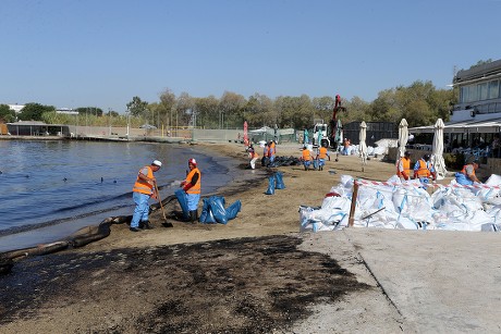Workers Cleanup Crew Struggle Remove Oil Editorial Stock Photo - Stock ...