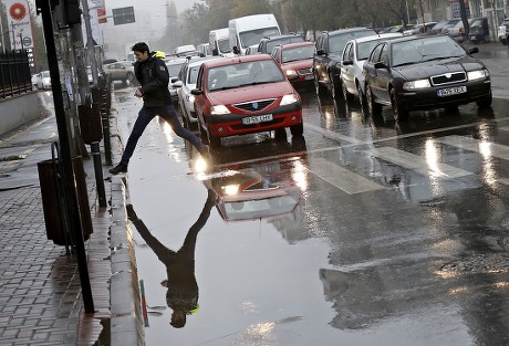 Romanian Man Jumps Over Puddle After Editorial Stock Photo - Stock ...