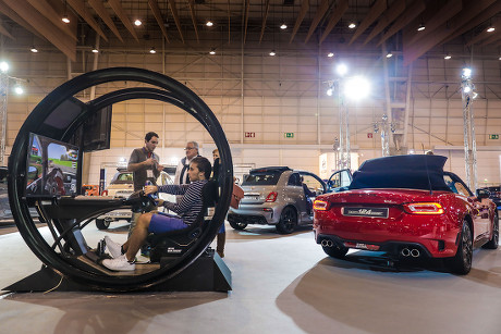 Visitors Try Racing Video Game During Editorial Stock Photo - Stock ...