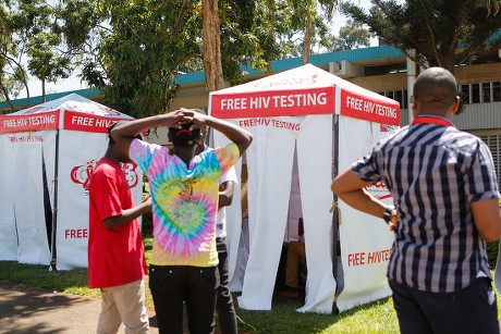 Young Men Stand Outside Free Hiv Editorial Stock Photo - Stock Image ...