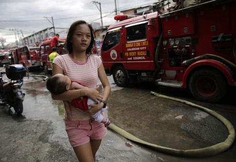 Fire burns at least a hundred houses to the ground at residential area ...