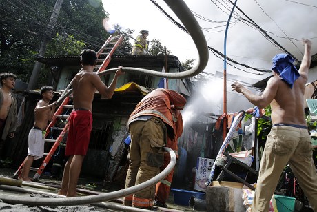 Fire burns at least a hundred houses to the ground at residential area ...