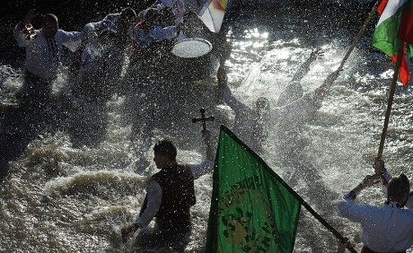 Icy river dip for epiphany celebrations, Zverino, Bulgaria - 06 Jan ...