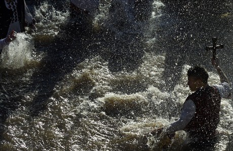 Icy river dip for epiphany celebrations, Zverino, Bulgaria - 06 Jan ...