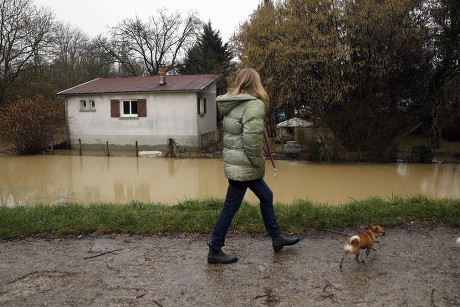 Woman Walks By Flooded Street By Editorial Stock Photo - Stock Image ...
