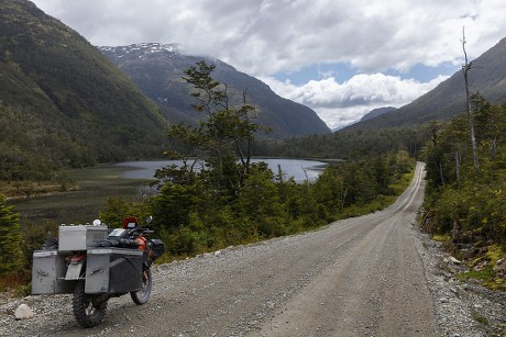 Heavily Packed Motorcycle On Gravel Road Editorial Stock Photo - Stock ...