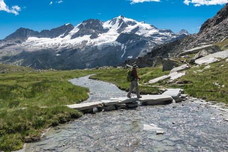 Hiker Crosses Mountain Stream Alpine Meadow Editorial Stock Photo ...