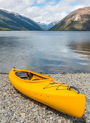 Yellow Kayak Lying On Beach Lake Editorial Stock Photo - Stock Image ...