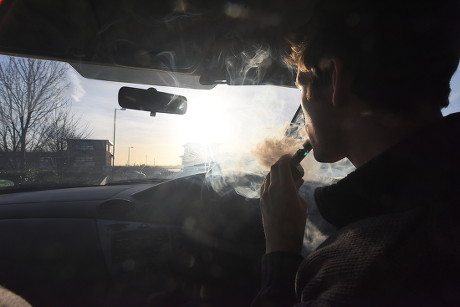__COUNT__ Person vaping while driving in a car - Feb 2018 Stock ...