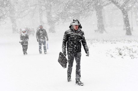 People Walk Through Heavy Snow Green Editorial Stock Photo - Stock ...