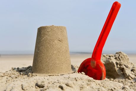 Wet Sand Shape Bucket On Beach Editorial Stock Photo - Stock Image ...