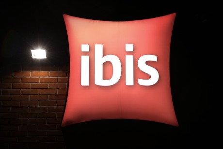 Ibis Illuminated Hotel Sign Editorial Stock Photo - Stock Image ...