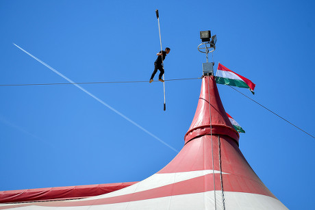 Acrobat Performs On Stretched Wire Rope Editorial Stock Photo - Stock ...
