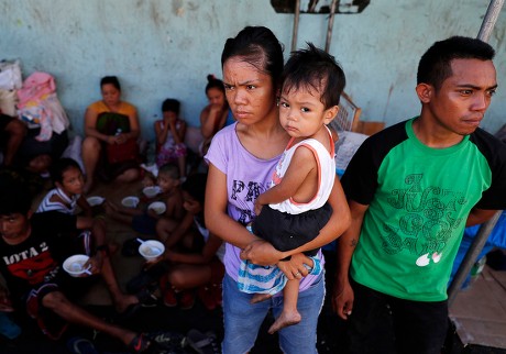 Filipino Fire Victims Rest On Side Editorial Stock Photo - Stock Image ...