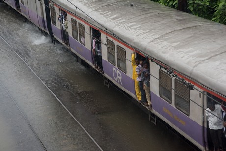 Train Seen Running Through Flooded Railway Editorial Stock Photo ...