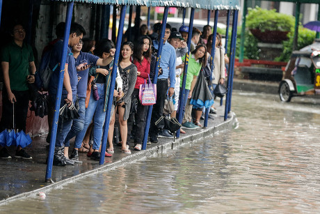 Commuters Wait Public Transportation Along Flooded Editorial Stock ...