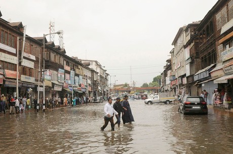 People Walk Through Waterlogged Road After Editorial Stock Photo ...