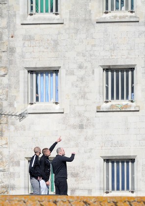 Three Prisoners Protest On Rooftop Hm Editorial Stock Photo - Stock ...