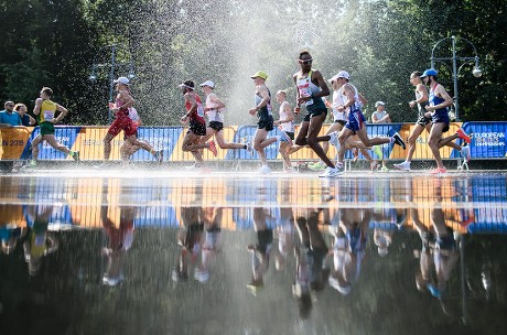 Athletes Passby Shower During Mens Marathon Editorial Stock Photo ...