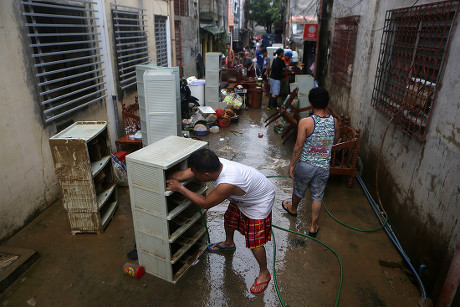 Residents Clean Mud Debris After Flood Editorial Stock Photo - Stock ...