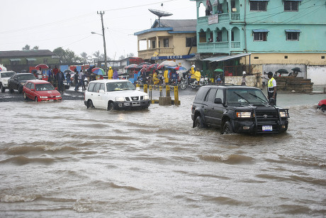 Motorisits Wade Through Floodwaters On Street Editorial Stock Photo ...