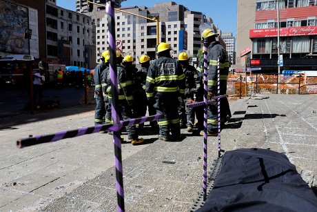 Firemen Stand Behind Three Crosses During Editorial Stock Photo - Stock ...