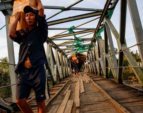 Myanmar Laborers Load Alcohol Bottles On Editorial Stock Photo - Stock ...
