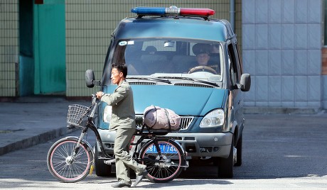 North Korean Man Pushes His Bicycle Editorial Stock Photo - Stock Image ...