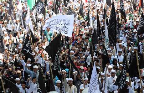 Indonesian Muslims Hold Tawheed Flags During Editorial Stock Photo ...