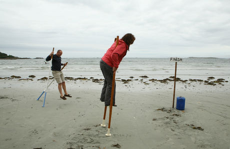 Stilt Walking Race On Beach Rocqaine Editorial Stock Photo - Stock ...