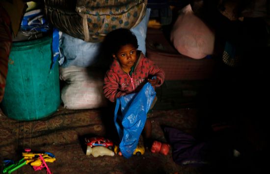 Indian Rag Picker Boy Sits Inside Editorial Stock Photo - Stock Image ...
