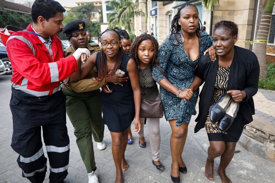 Women Escorted By Police Officer Evacuate Editorial Stock Photo - Stock ...
