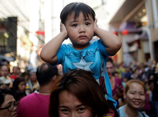Filipino Boy Covers His Ears During Editorial Stock Photo - Stock Image ...