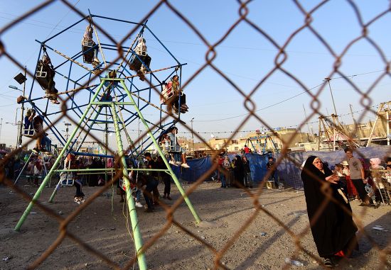 Iraqi Children Play On Swings During Editorial Stock Photo - Stock ...