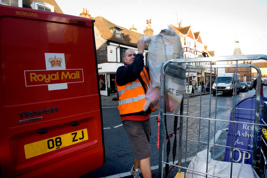 Model Released Postman Delivering Post Editorial Stock Photo - Stock ...