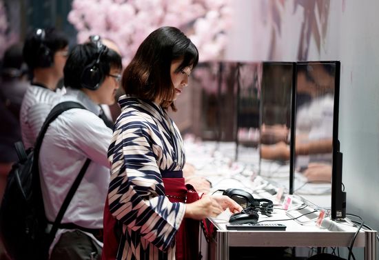 Staff Member Prepares Game Console During Editorial Stock Photo - Stock ...