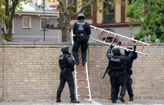 Police Officers Climb Over Cemetery Wall Editorial Stock Photo - Stock ...