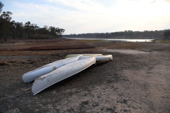 Canoes Lie Inside Nearly Dry Reservoir Editorial Stock Photo - Stock ...