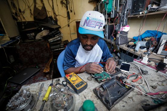 Electronic Repair Man Works On Radio Editorial Stock Photo - Stock ...