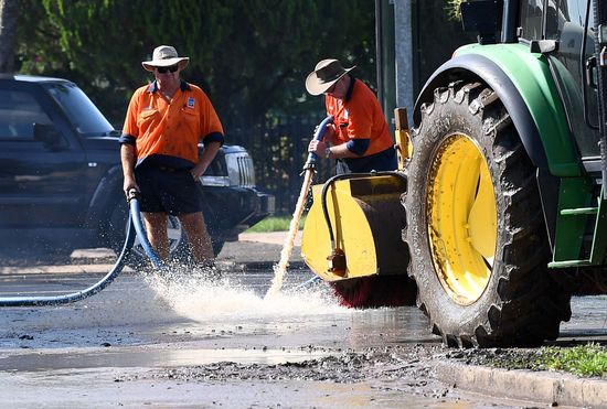 Council Workers Wash Mud Off Road Editorial Stock Photo - Stock Image ...