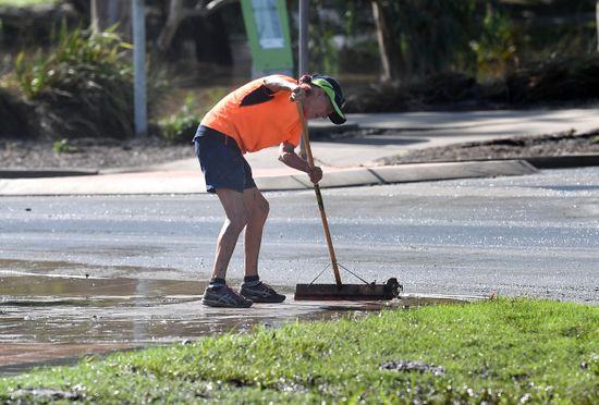 Worker Mops Mud Off Footpath Dalby Editorial Stock Photo - Stock Image ...