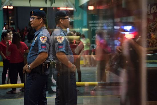 Police Officer Stands On Guard Outside Editorial Stock Photo - Stock ...