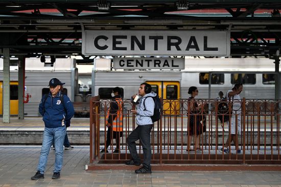 Rail Passengers Wait On Platform During Editorial Stock Photo - Stock ...