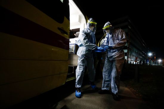 Paramedics Dress Protective Clothing Before Transporting Editorial ...