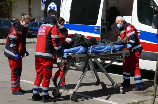 Ambulance Crew Members Transport Patient On Editorial Stock Photo ...